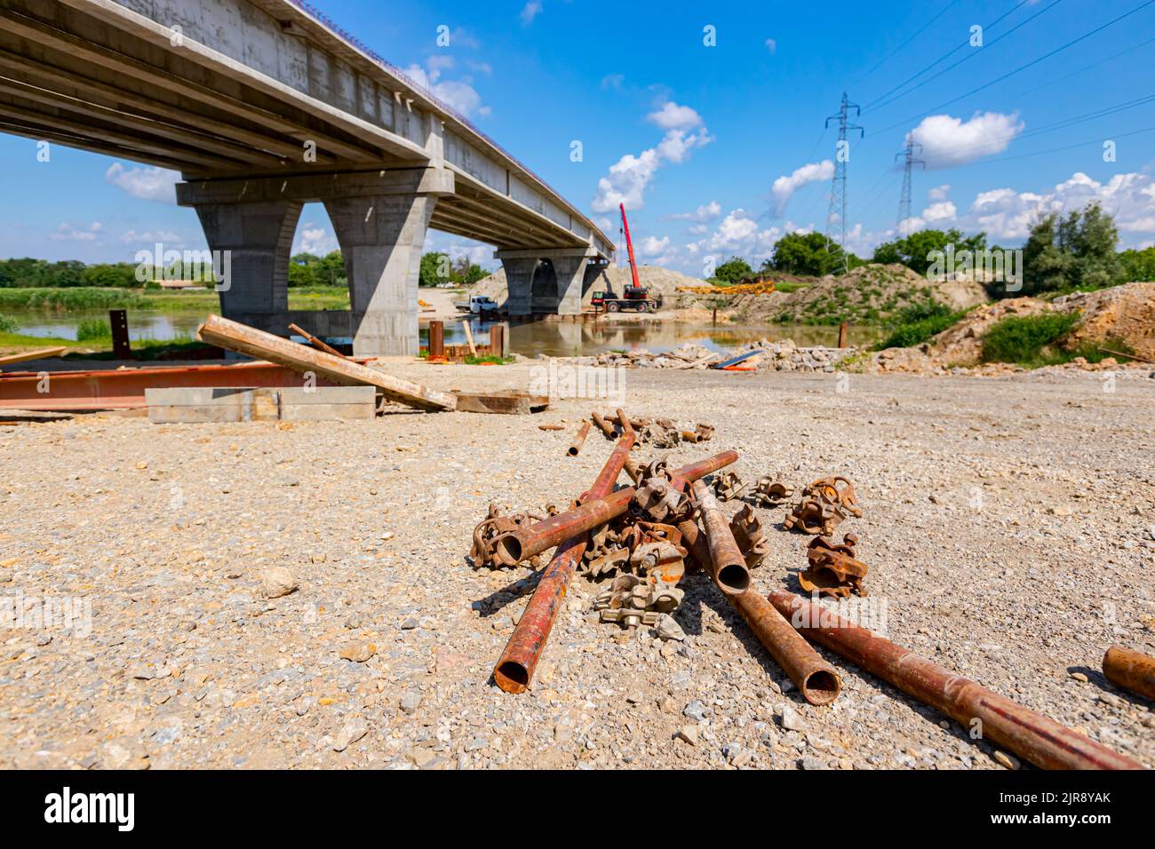 View on a heap of corrosion pipes disassembled steel scaffold joints ...