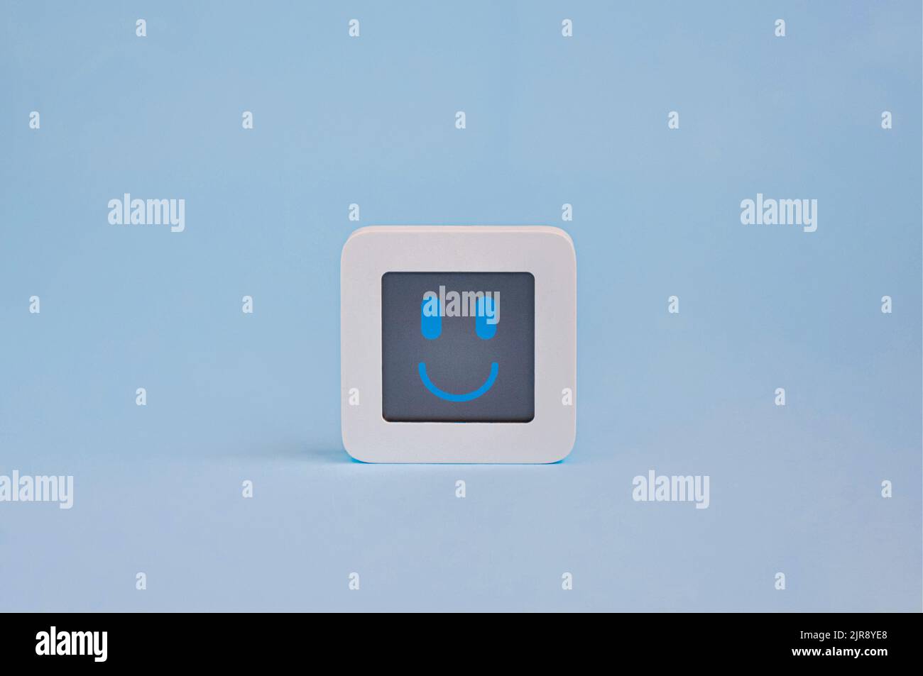 Happy emotion concept, symbol of smiley emoticon on lcd display ...