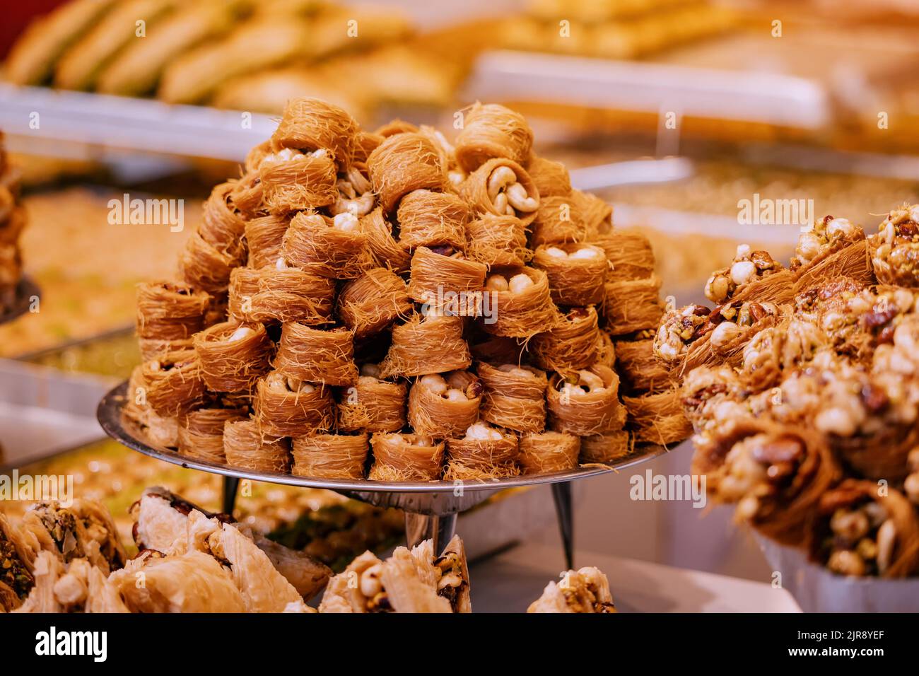 Kadayif traditional ottoman and arabic dessert with sugar noodles and ...