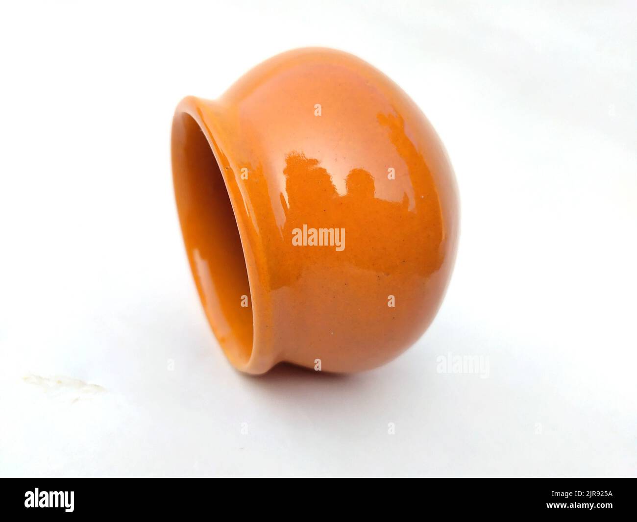 Brown clay pot isolated on white background Stock Photo - Alamy