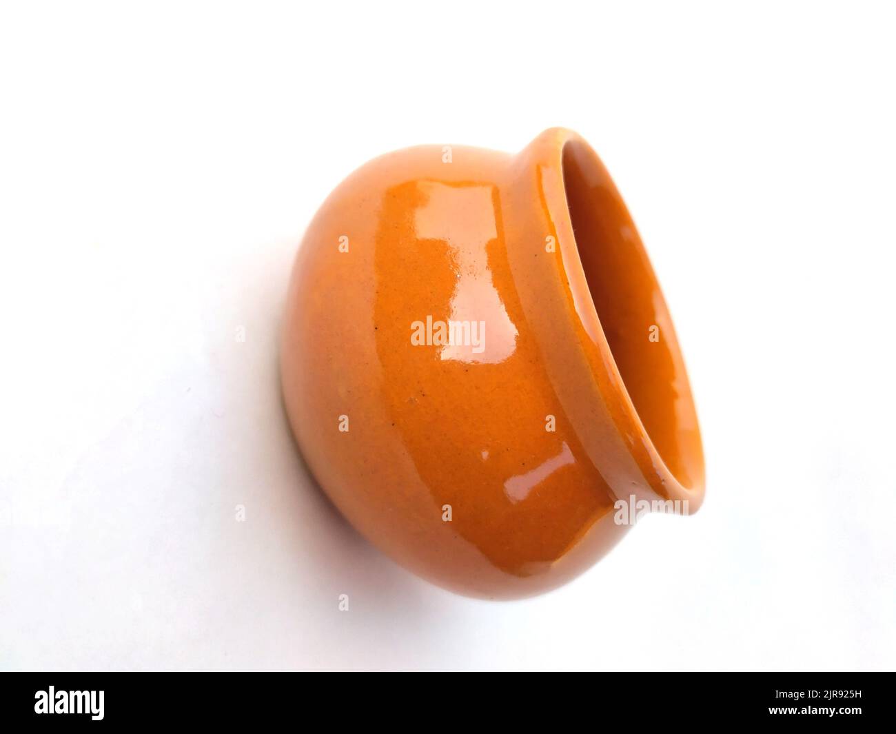 Brown clay pot isolated on white background Stock Photo - Alamy
