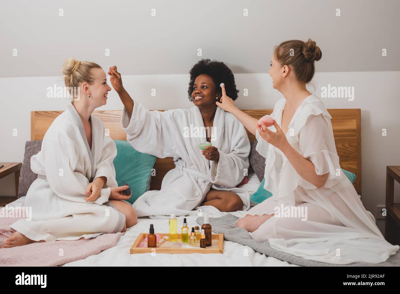 The young women are having a spa party Stock Photo - Alamy