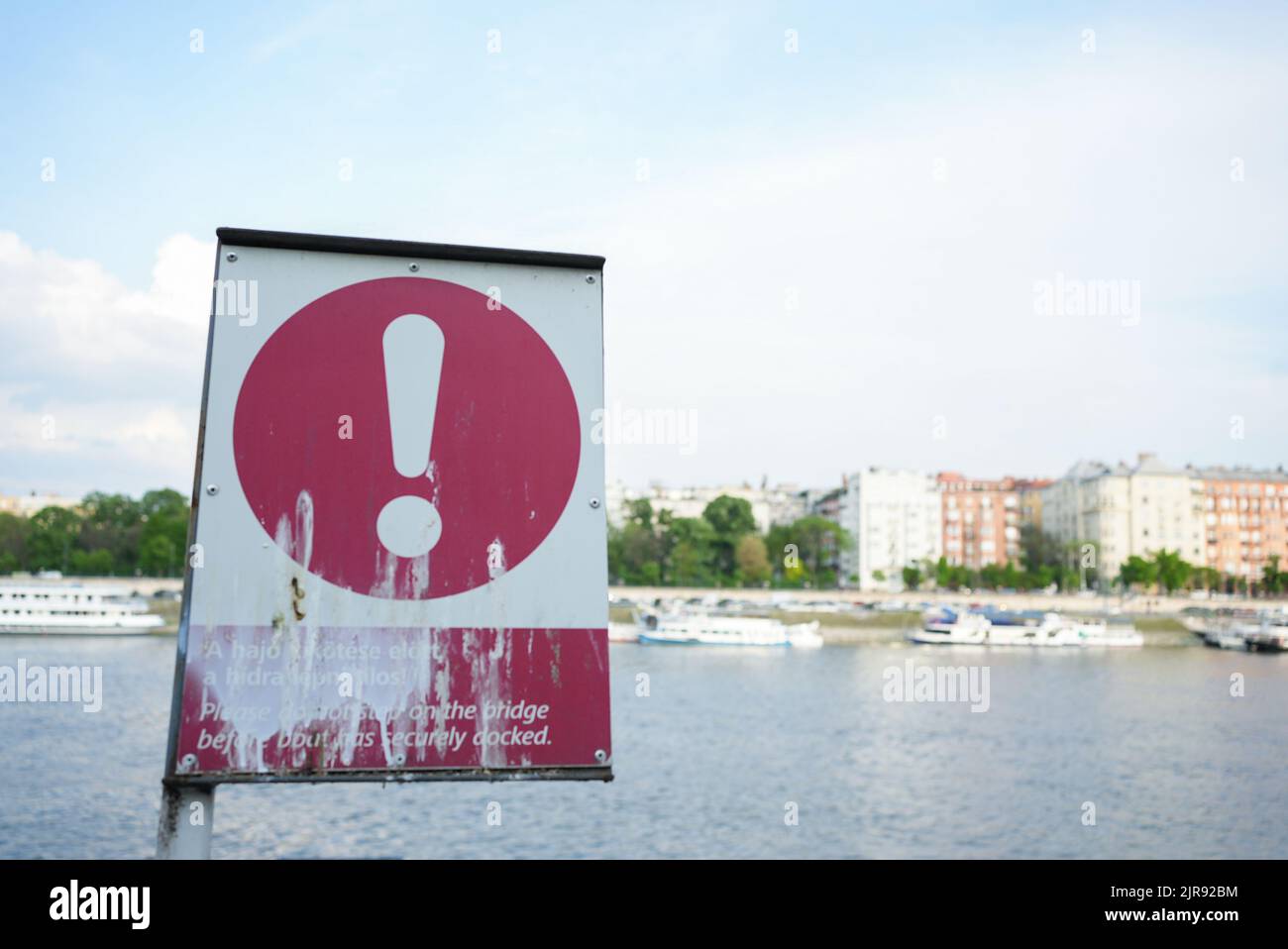 Forbidden due to danger warning sign near a river Stock Photo - Alamy