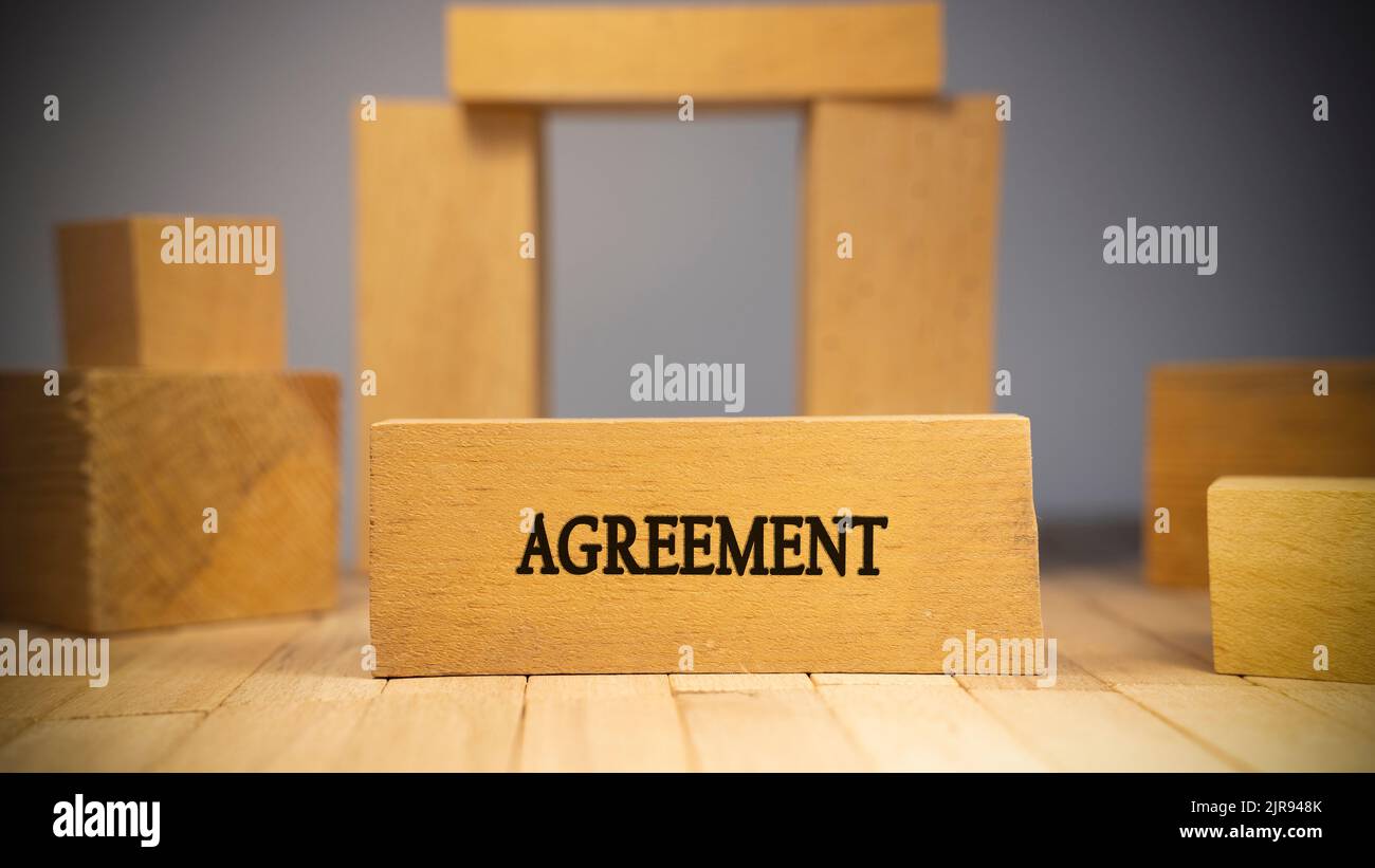 agreement was written on the wooden surface. Law and state system ...
