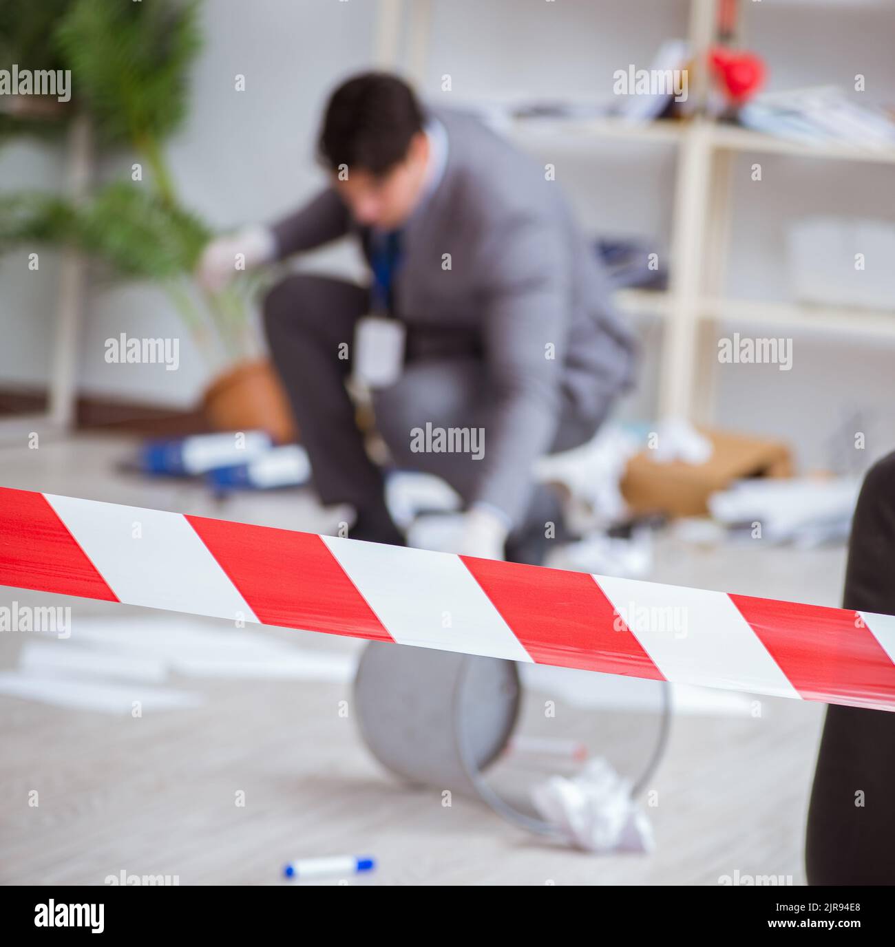 The young man during crime investigation in office Stock Photo - Alamy