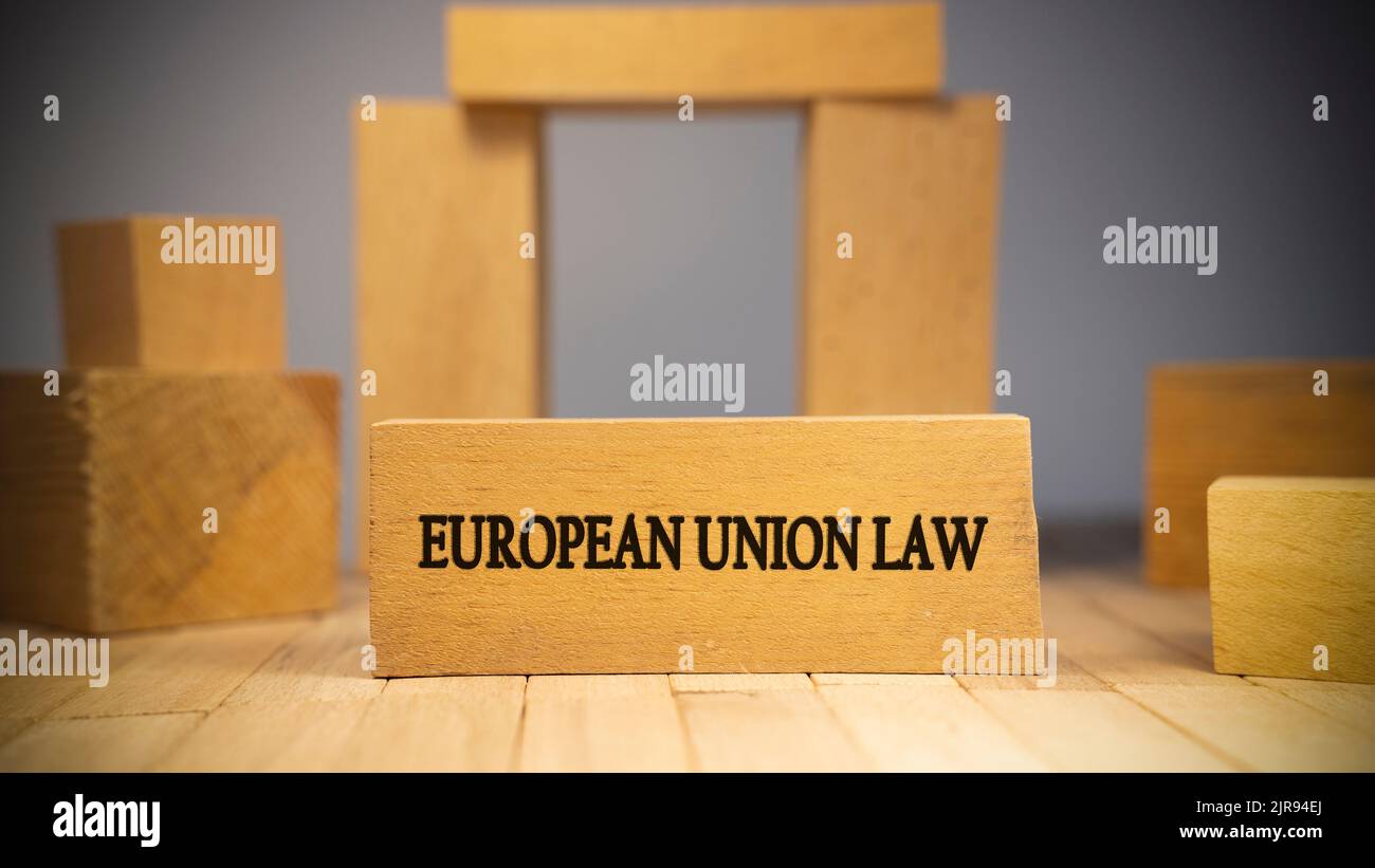 European union law written on wooden surface. Law and state system ...