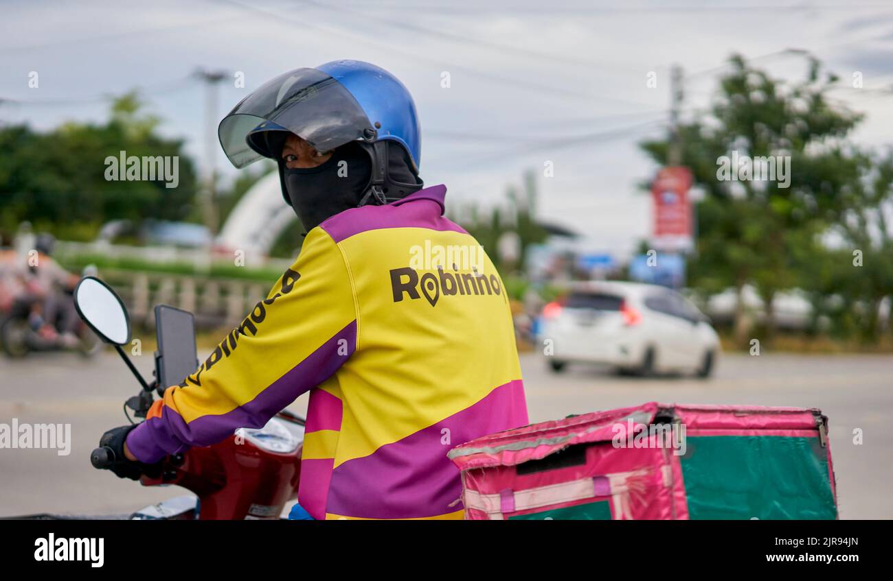 Food delivery service by motorcycle, taken in Pathumthani, Thailand ...