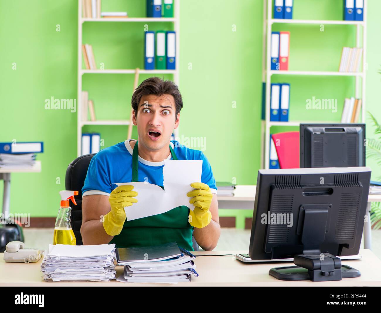 The male spy under cleaner cover stealing confidential documents Stock ...