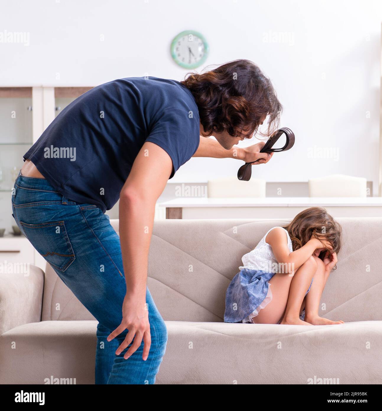 The angry father punishing his daughter Stock Photo - Alamy
