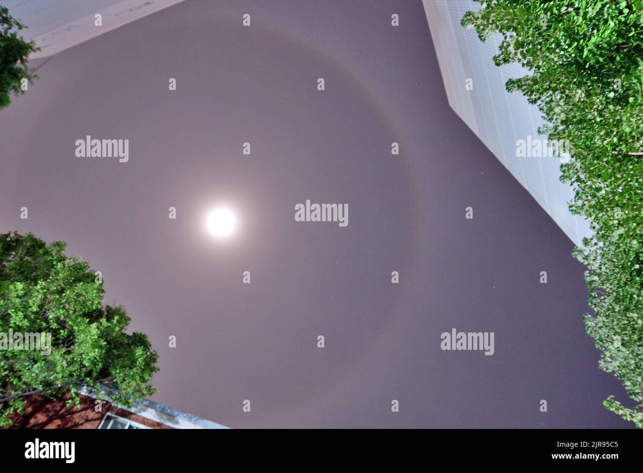 Lunar halo, halo around the Moon Stock Photo - Alamy