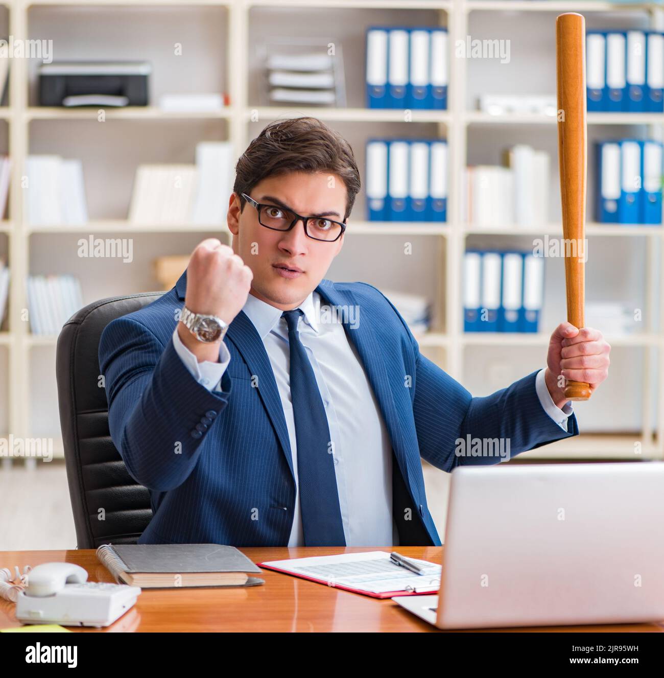 The angry aggressive businessman in the office Stock Photo - Alamy