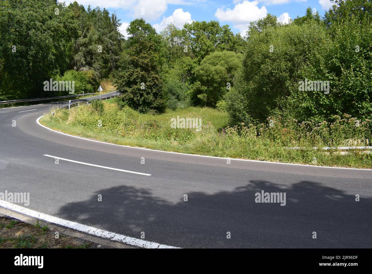 country road curve Stock Photo - Alamy