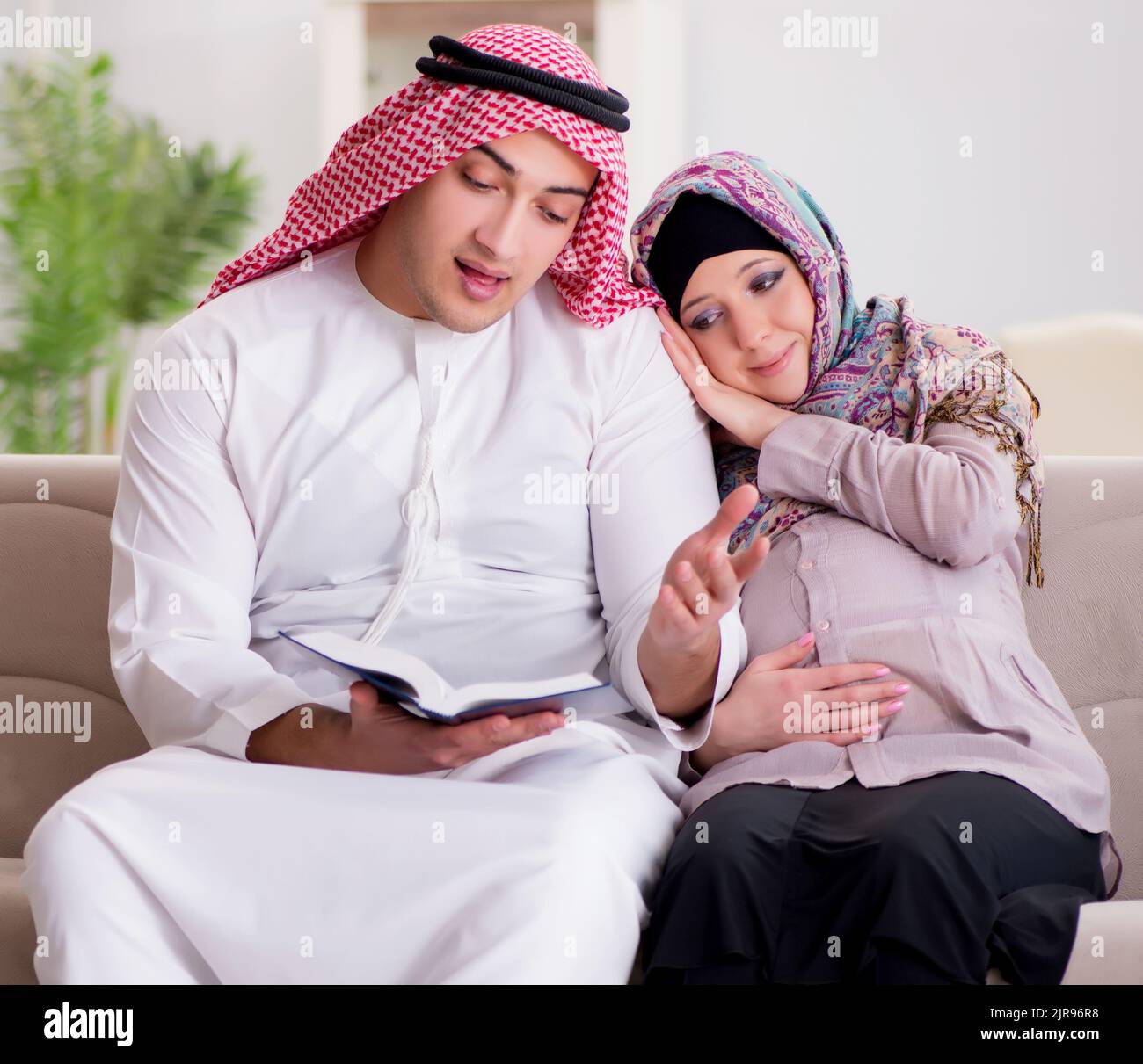 The young arab muslim family with pregnant wife expecting baby Stock ...