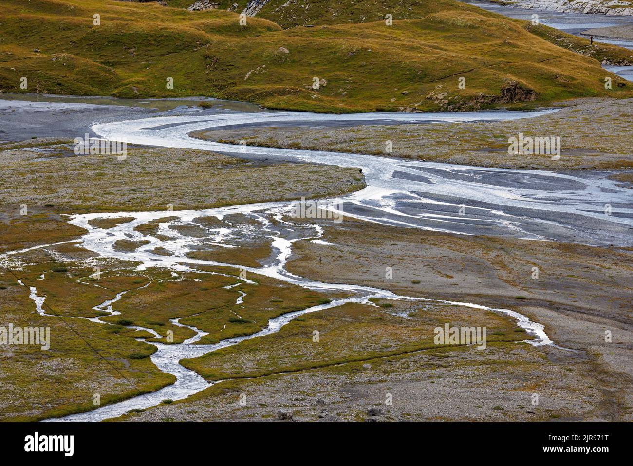 meandering alpine creek in valais Stock Photo - Alamy