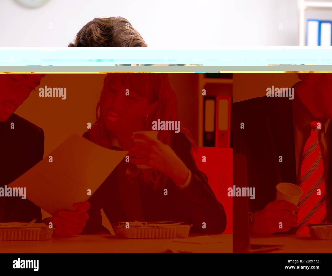 Two colleagues having lunch break at workplace Stock Photo - Alamy