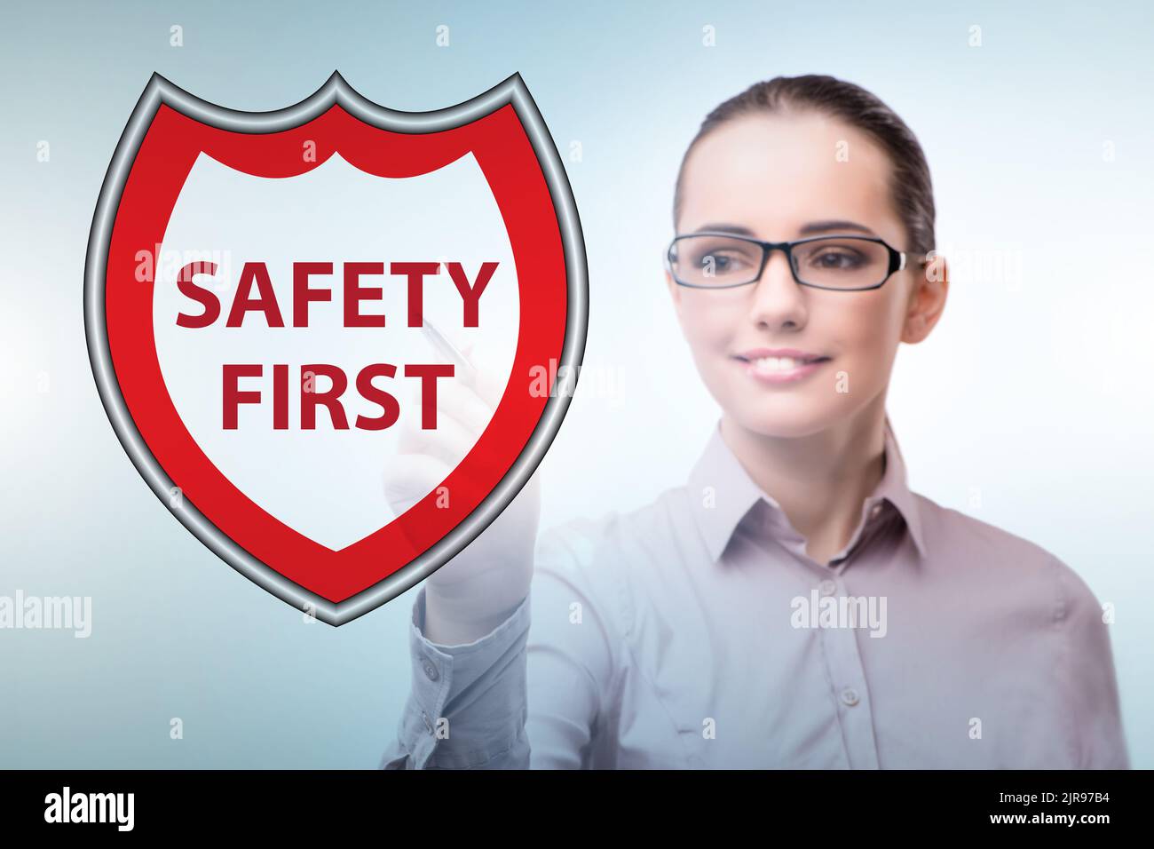 Safety first concept with the businesswoman Stock Photo - Alamy