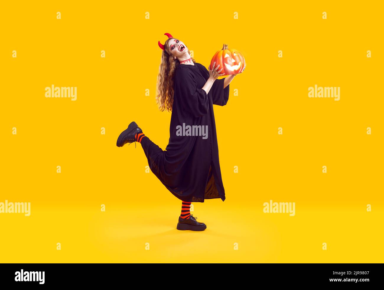 Emotional woman dressed as crazy devil for Halloween celebration ...