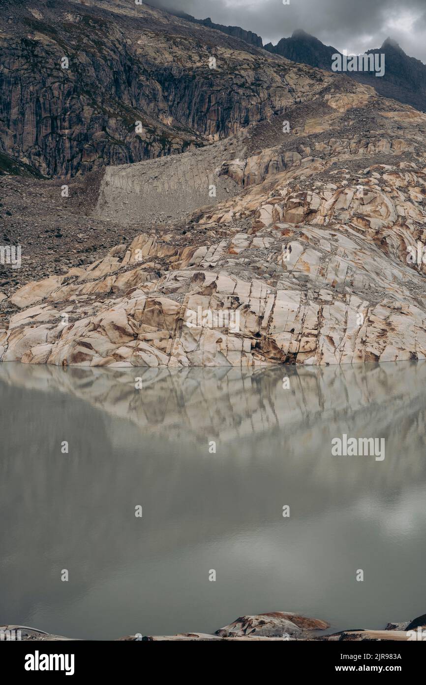 The Rhône Glacier is a glacier in the Swiss Alps and the source of the ...