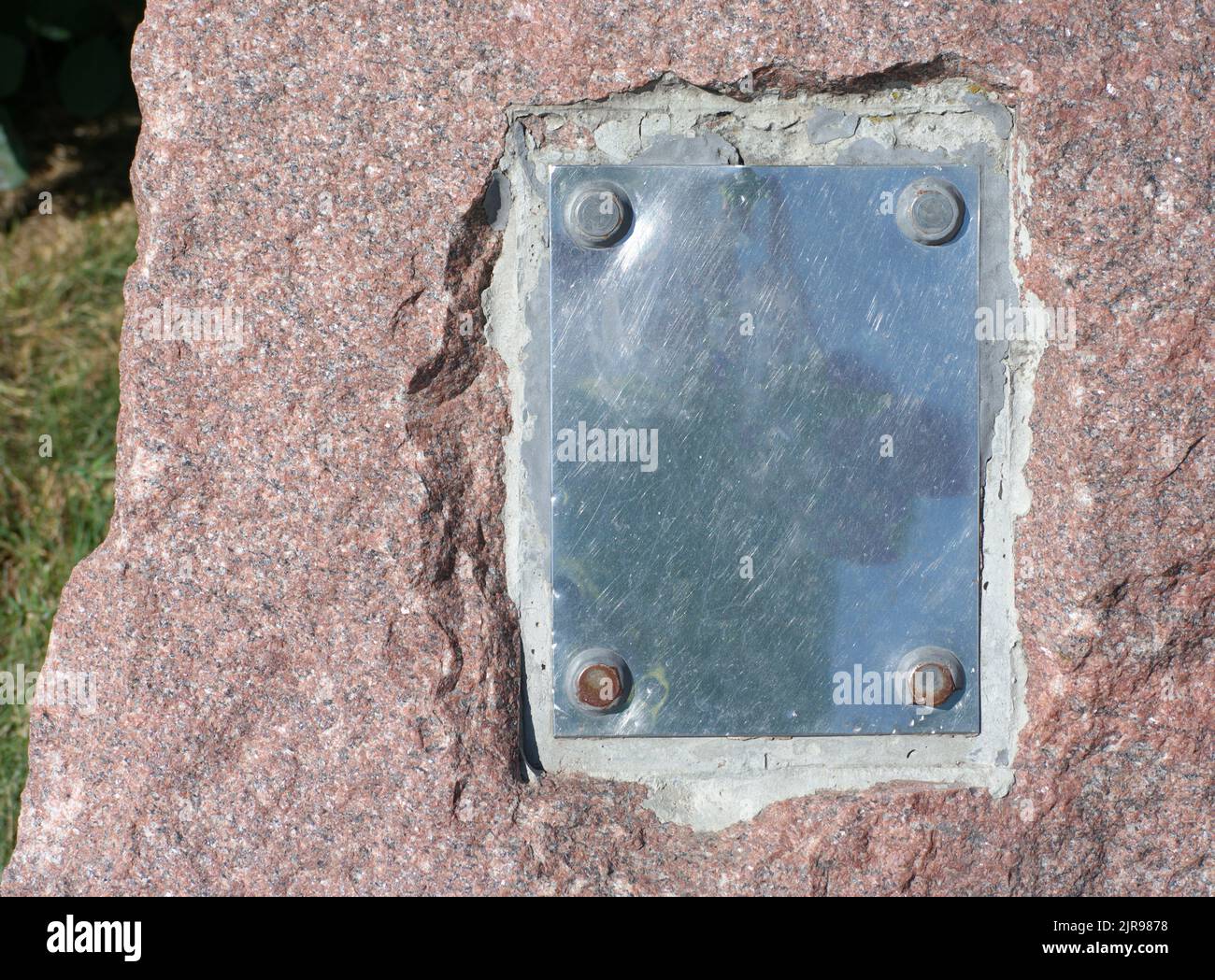 metal plate on granite stone in park at dry sunny summer day Stock ...