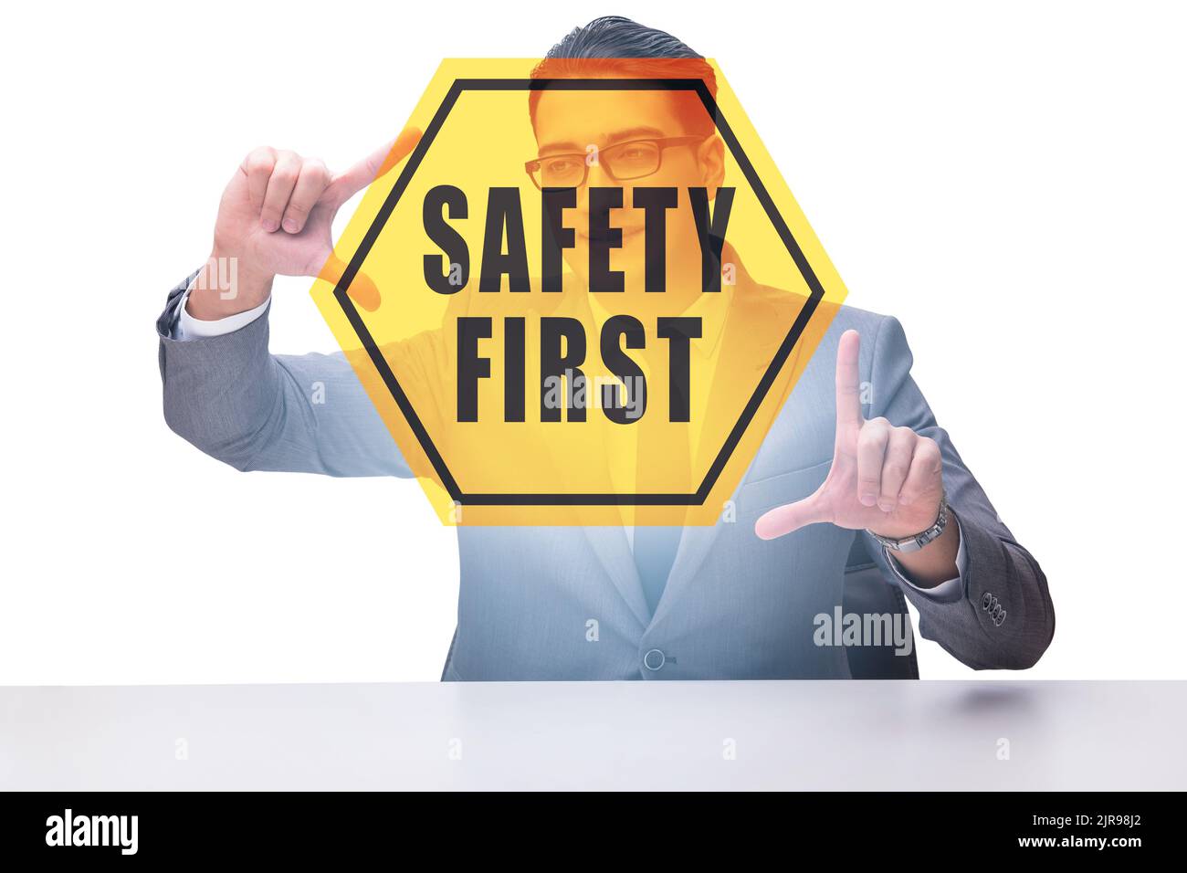 Safety first concept with the businessman Stock Photo - Alamy