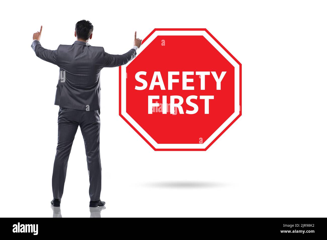 Safety first concept with the businessman Stock Photo - Alamy