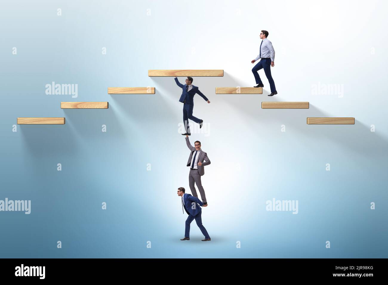 Teamwork concept with the businessmen helping each other Stock Photo ...