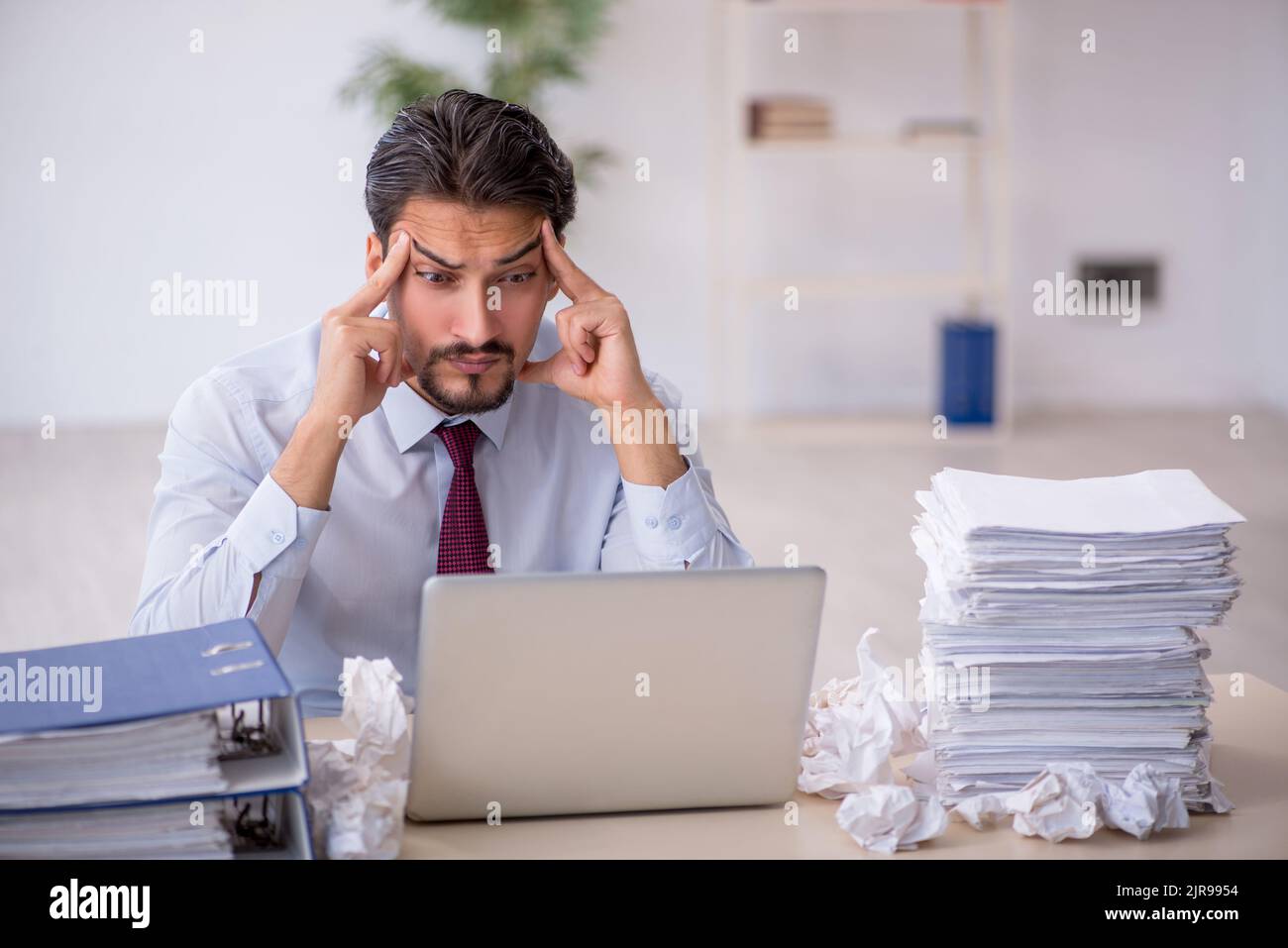 Young businessman employee in rejected ideas concept Stock Photo - Alamy