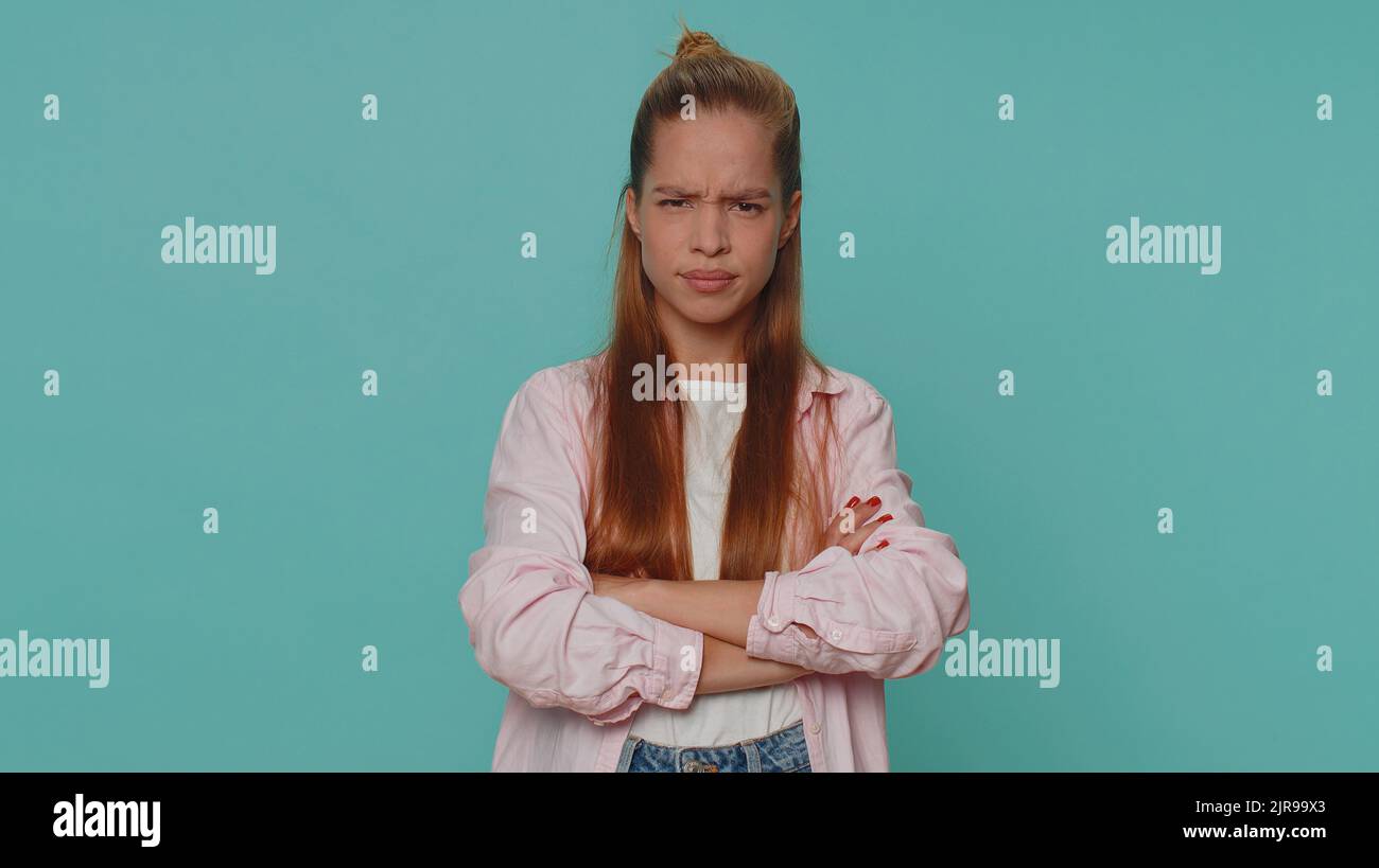 Dissatisfied pretty teenager girl asking reason of failure, expressing ...