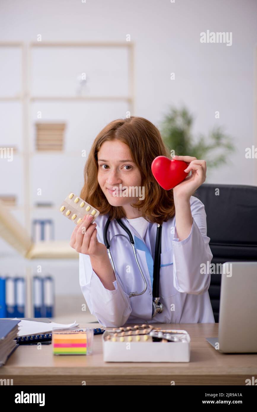 Young female doctor cardiologist working at the hospital Stock Photo ...