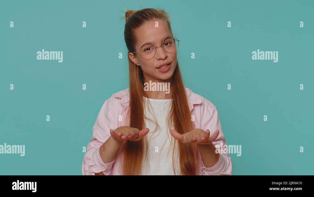 Hey you, be careful. Teenager girl warning with admonishing finger ...