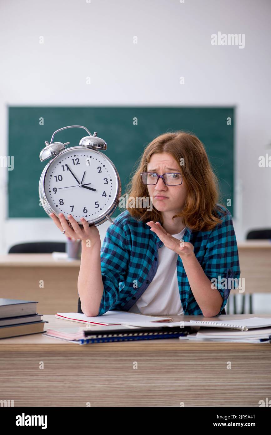 Female student in time management concept Stock Photo - Alamy