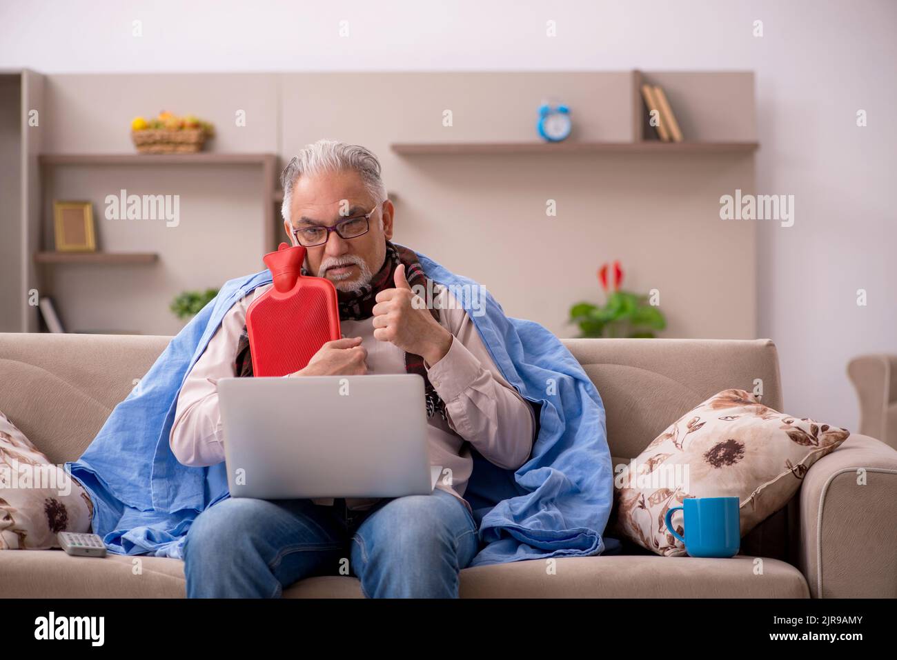 Man unwell hot water bottle hi-res stock photography and images - Alamy