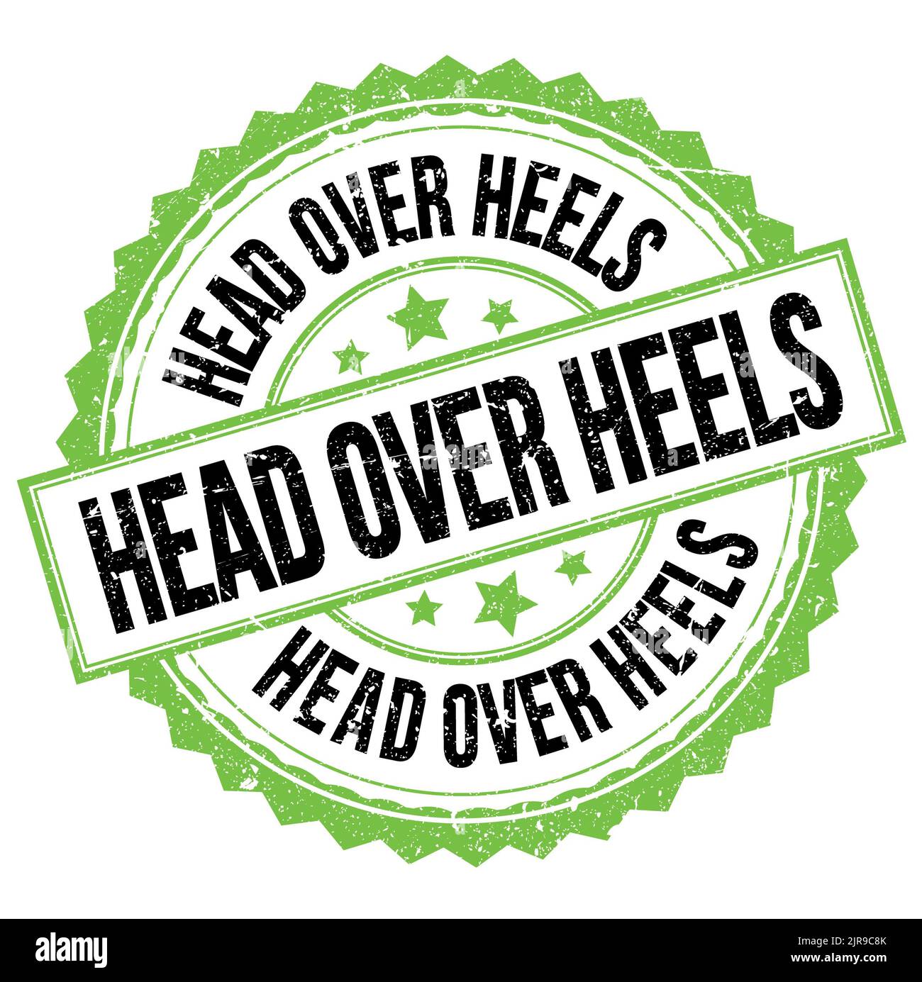 HEAD OVER HEELS text written on green-black round stamp sign Stock ...