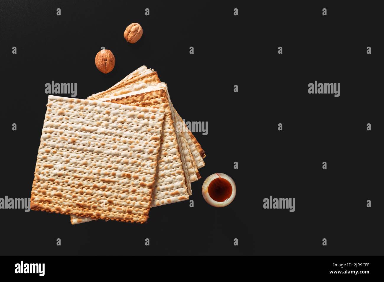 A photo of matzah or matza pieces on black background. Matzah for the ...