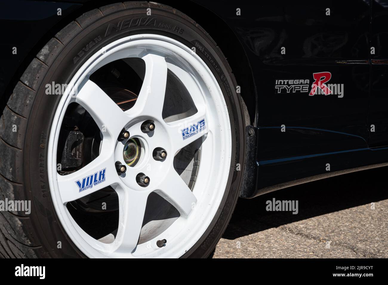 A closeup of a beautiful white Volk Rays wheel mounted on a Honda ...