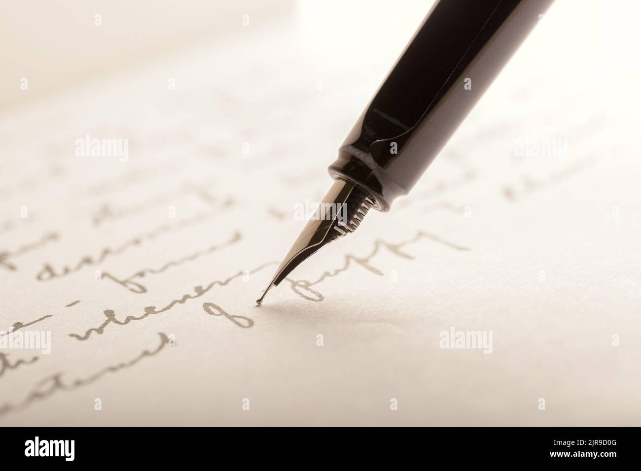 Fountain Pen on Written Page Stock Photo - Alamy
