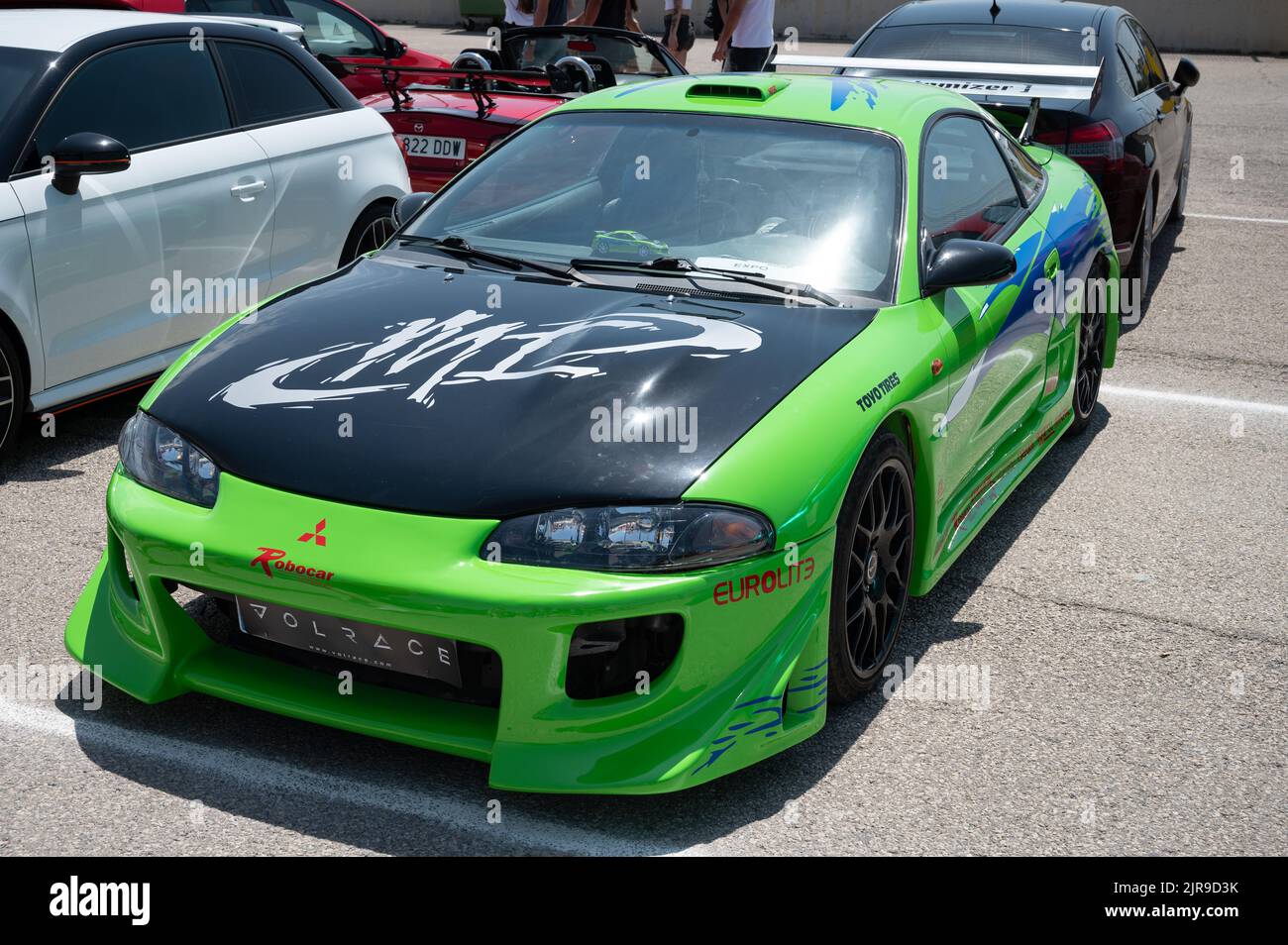 A second-generation green Mitsubishi Eclipse, tuned in style of Brian O ...