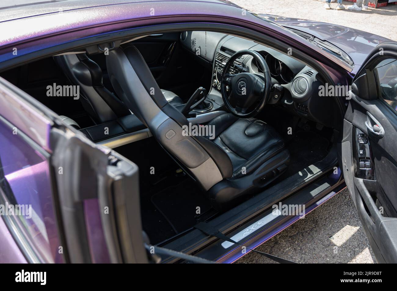 An interior of a Mazda Rx-8, the original cockpit with its peculiar ...