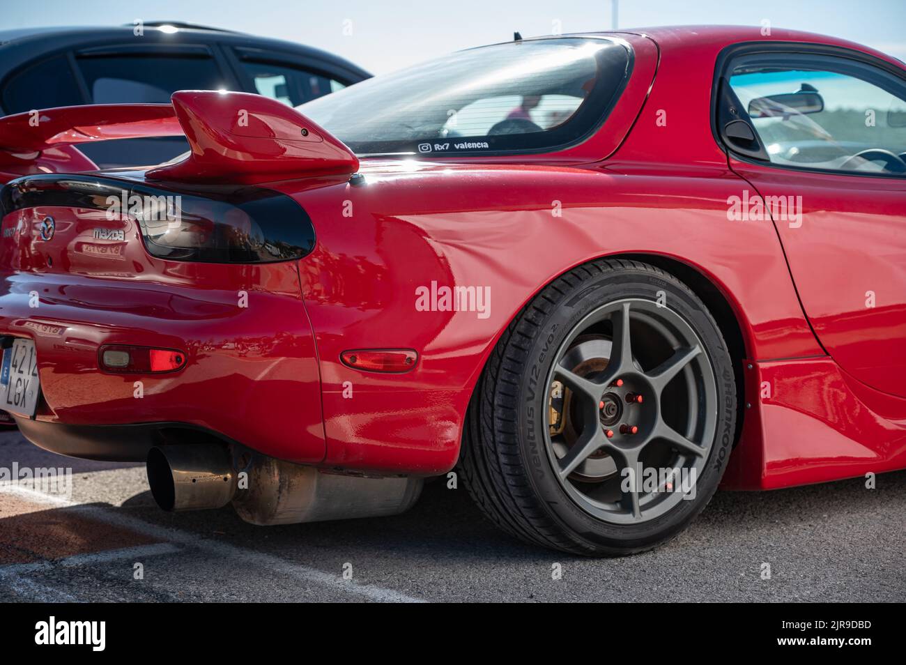 A rear view of a classic red Japanese Mazda RX-7 sports car Stock Photo ...