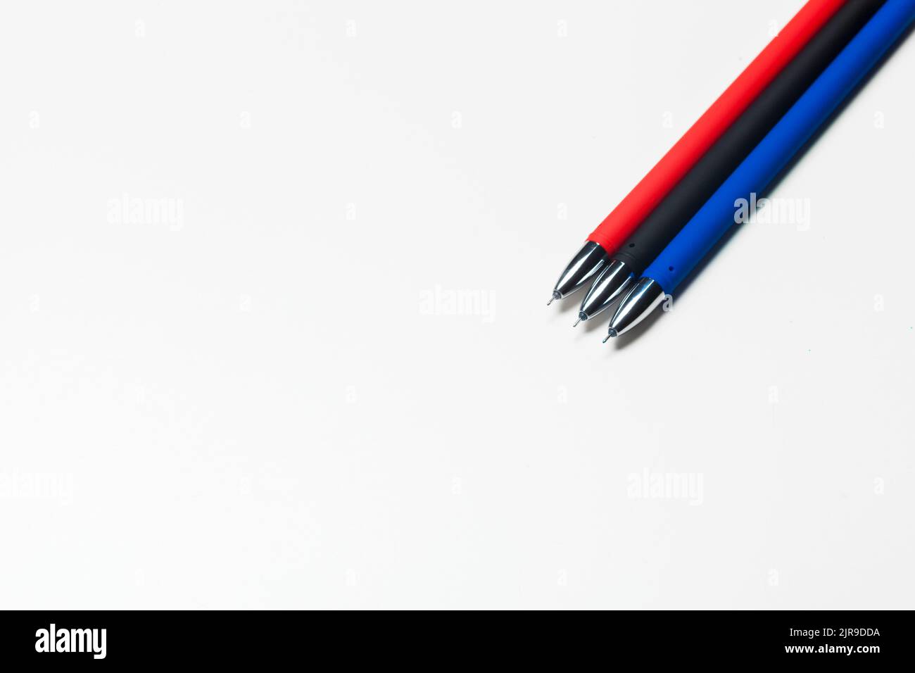 different colors pens isolated on the white background Stock Photo - Alamy