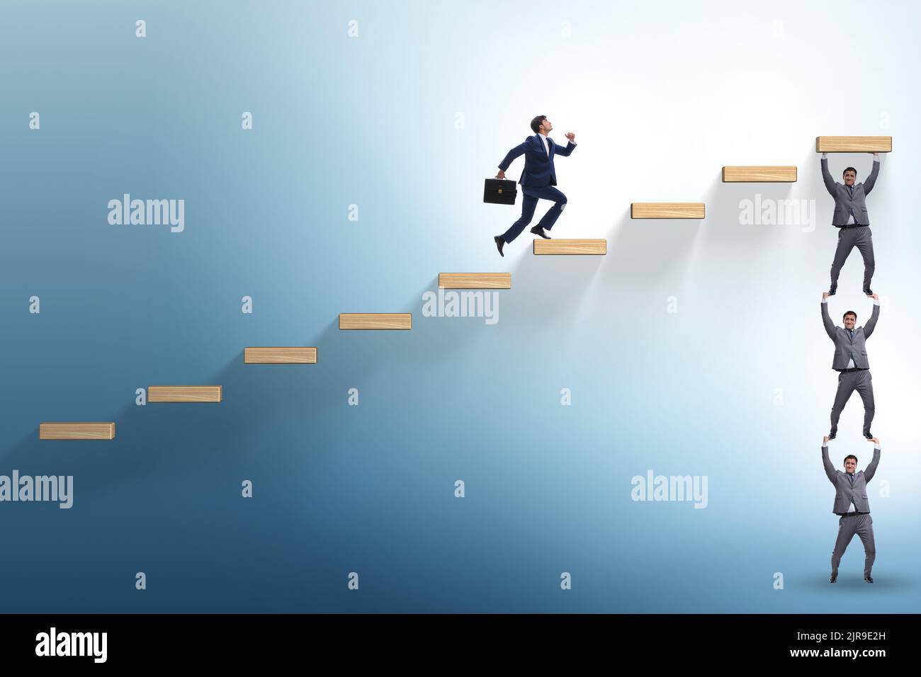 Teamwork concept with the businessmen helping each other Stock Photo ...