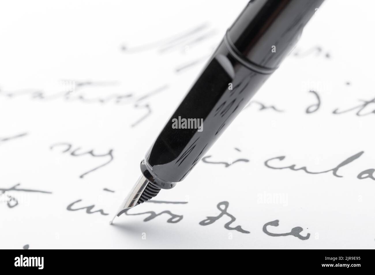 Fountain Pen on Written Page Stock Photo - Alamy