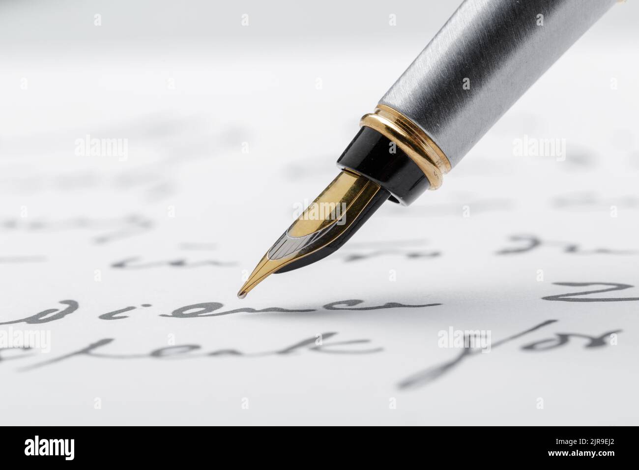 Fountain Pen on Written Page Stock Photo - Alamy