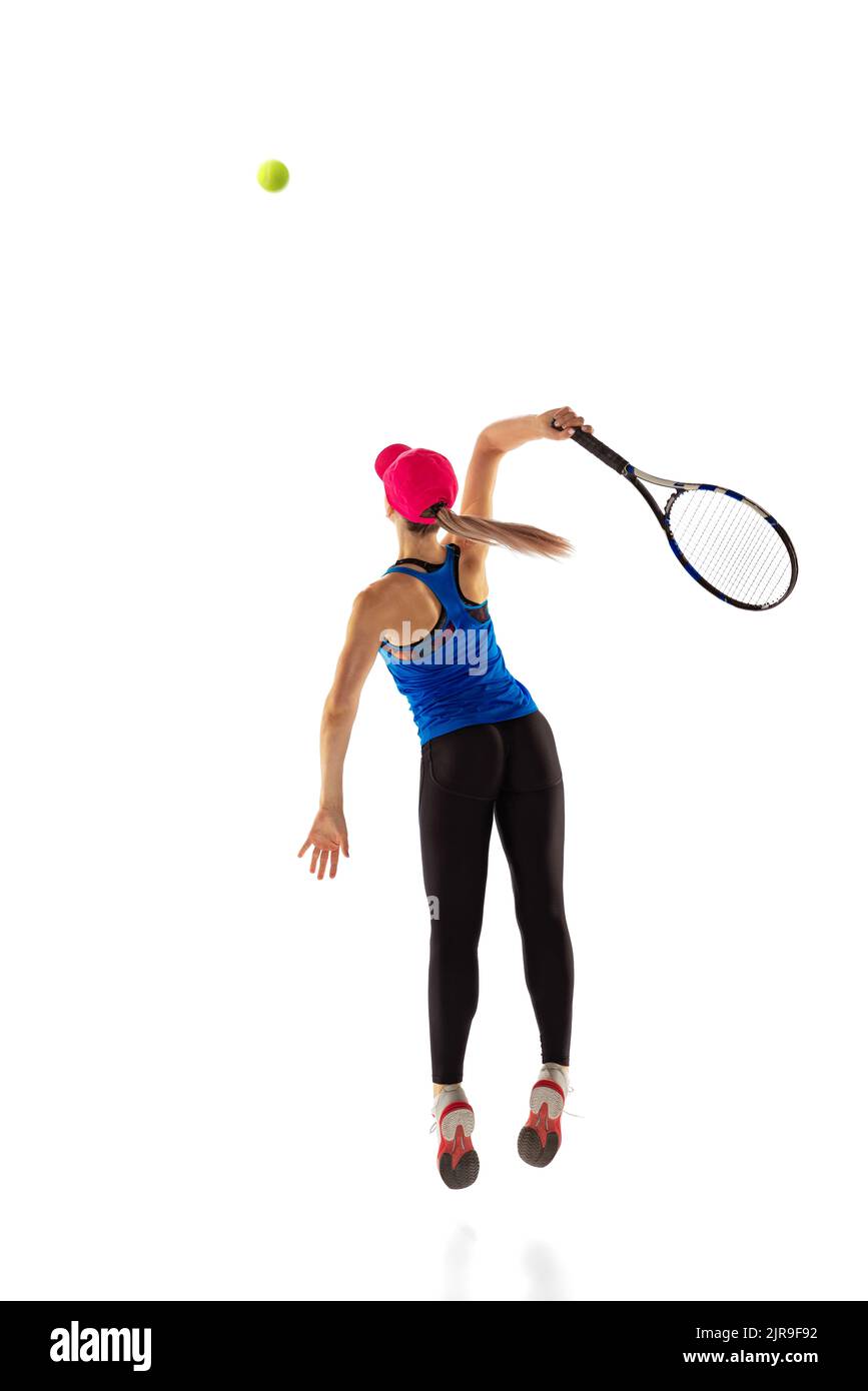 Training of female tennis player practicing power serving isolated on ...