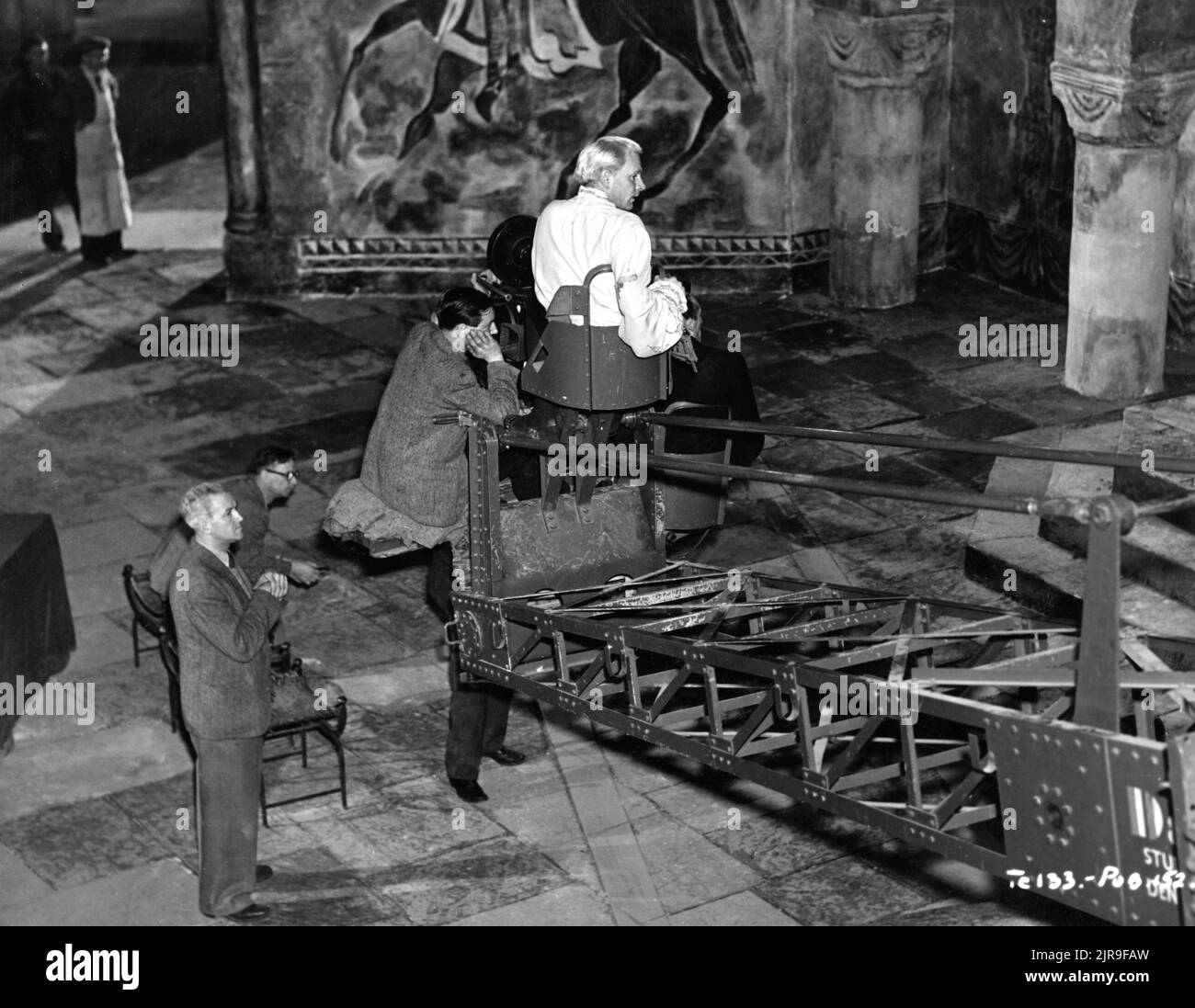 Director / Star LAURENCE OLIVIER on camera crane at Denham Studios with Cinematographer DESMOND ...