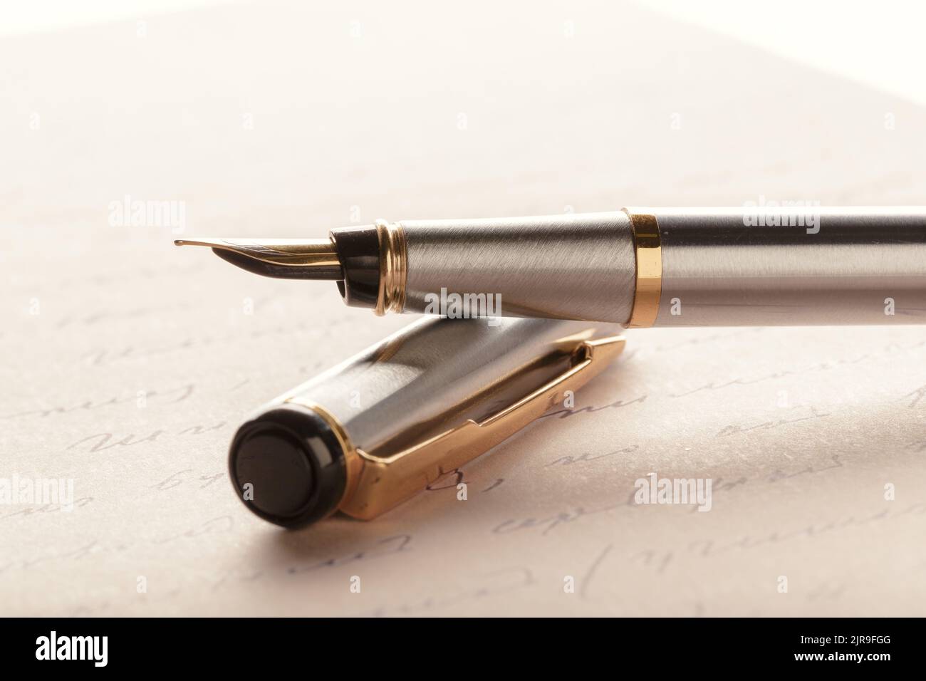 Fountain Pen on Written Page Stock Photo - Alamy