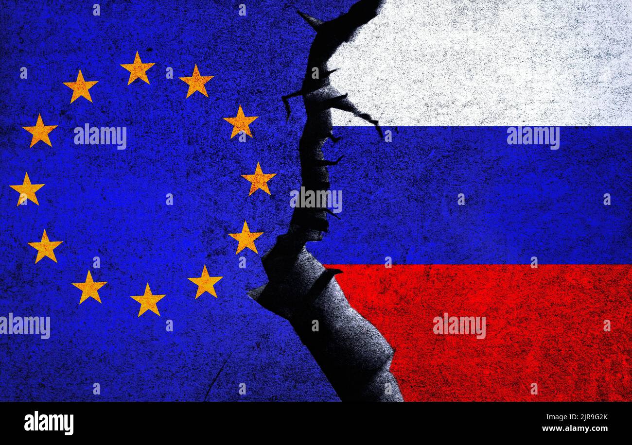 Russia vs European Union concept flags on a wall with a crack. EU and ...