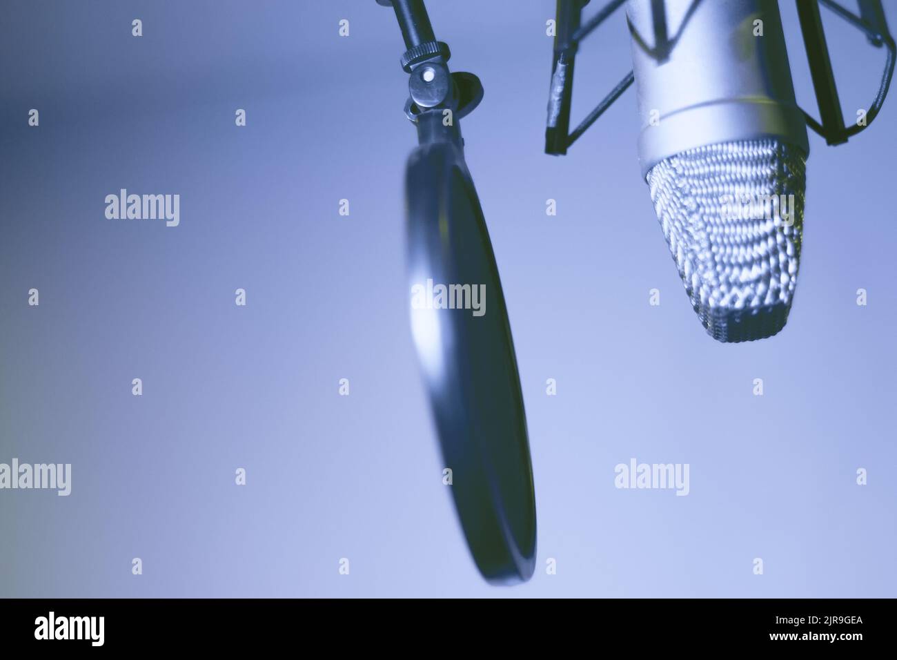 Professional microphone suspended in the air of professional studio ...