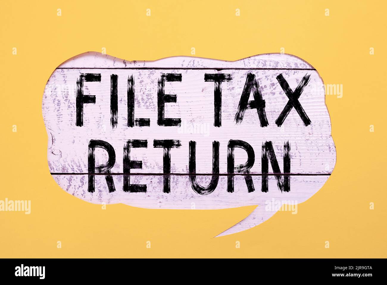 Writing displaying text File Tax Return. Business idea Paperwork to get ... Writing displaying text File Tax Return. Business idea Paperwork to get ...