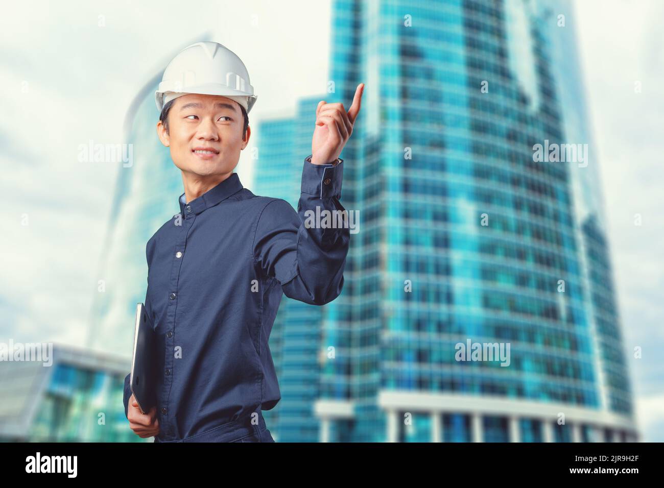 Handsome young asian man architect Stock Photo - Alamy